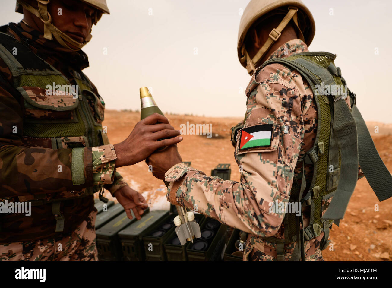 Soldiers in the mortars section of the Jordanian Armed Forces Border ...