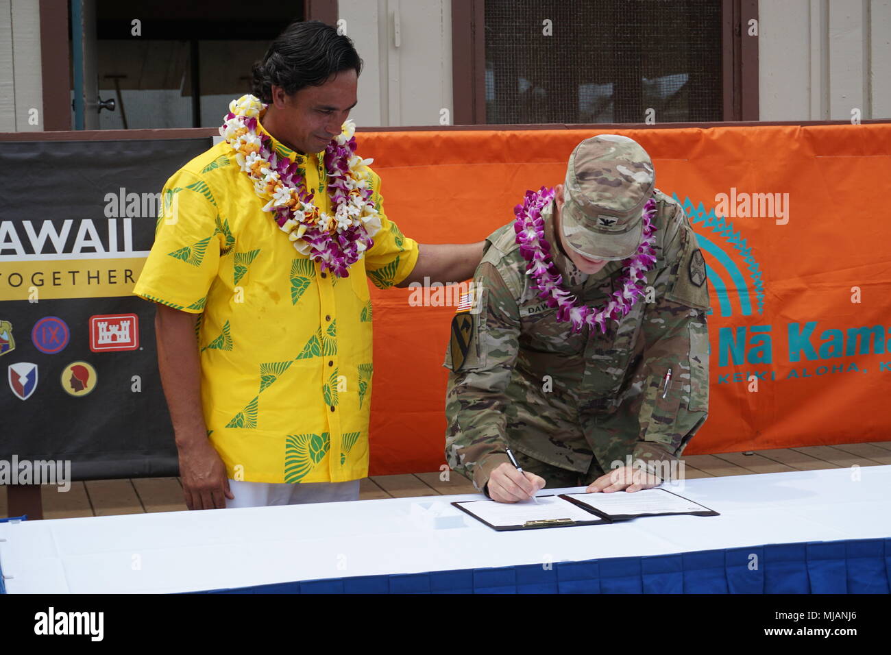 Col. Stephen Dawson, commander, U.S. Army Garrison-Hawaii signs the ...