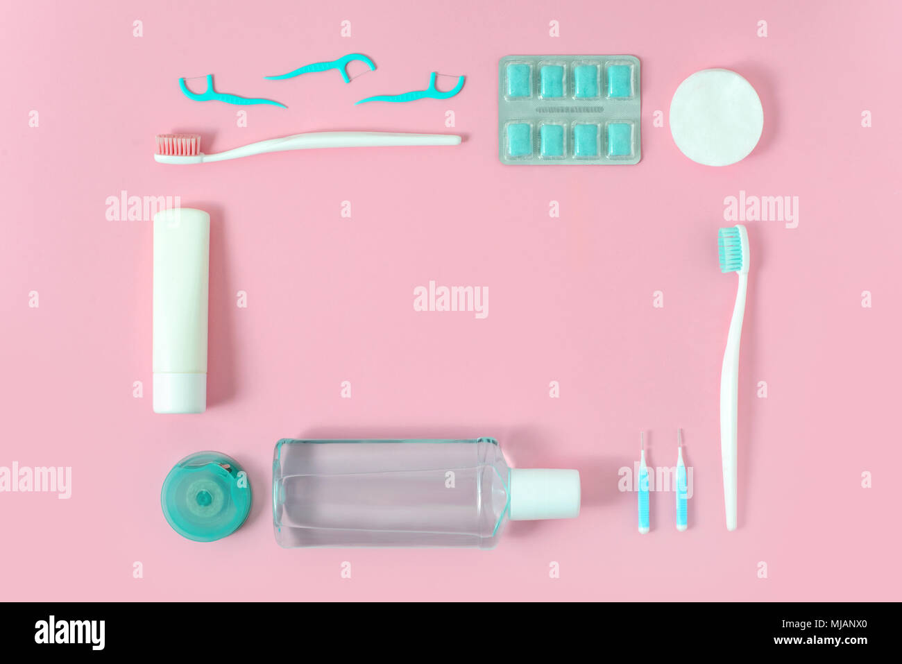 Toothbrushes, toothpaste, rinse and chewing gum set in shape of frame ...