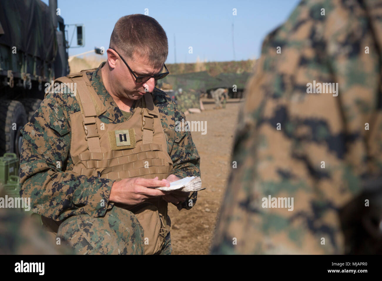 U.S. Navy Lt. Robert Price, a chaplain with 3rd Battalion, 12th Marine ...