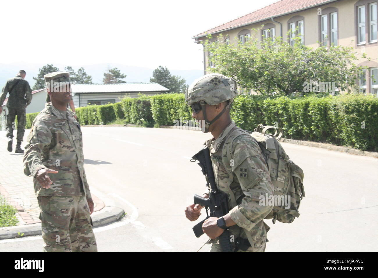 3-61 CAV Sgt. Maj. Thomas Ray, left, gives Sgt. Bradley R. Dompke some ...