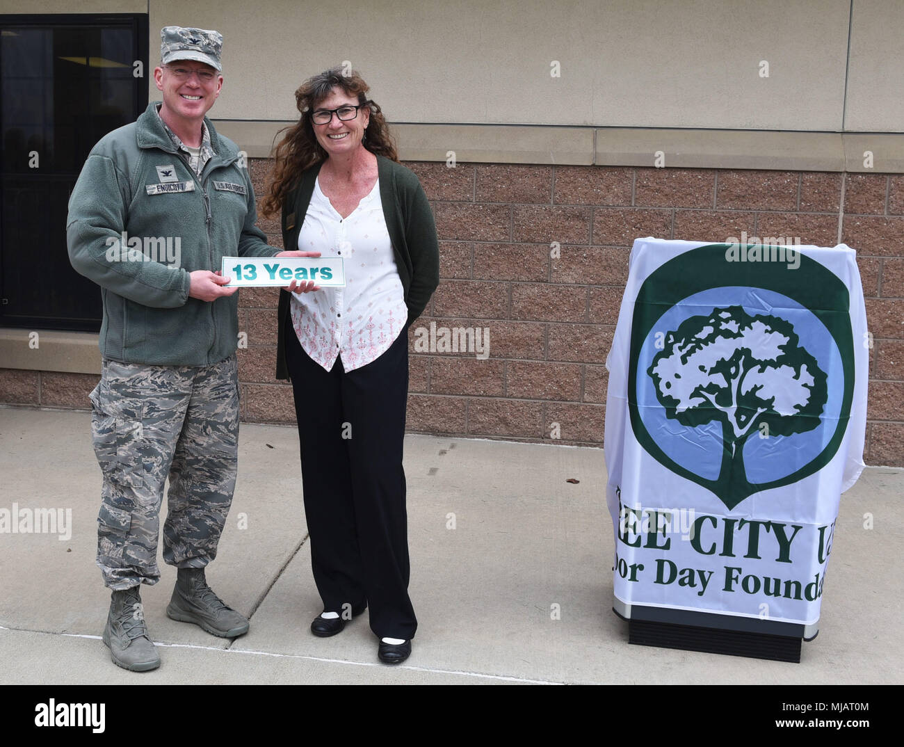 Col. Troy L. Endicott, 460th Space Wing commander, and Ms. Nancy Klasky ...