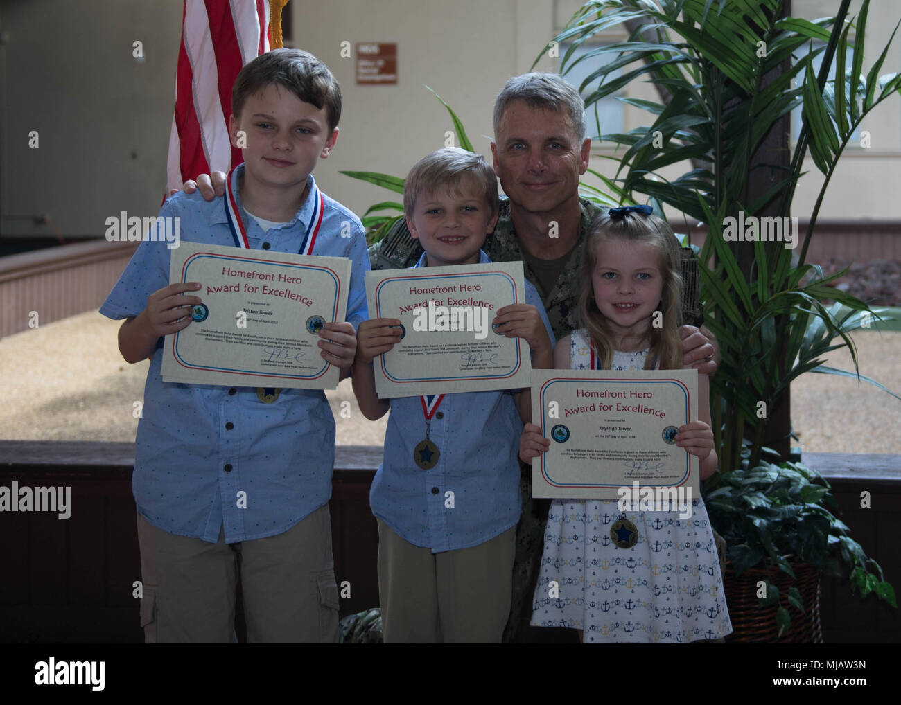180426-N-ND356-0093 PEARL HARBOR (Apr. 26, 2018) A Homefront Hero award ...