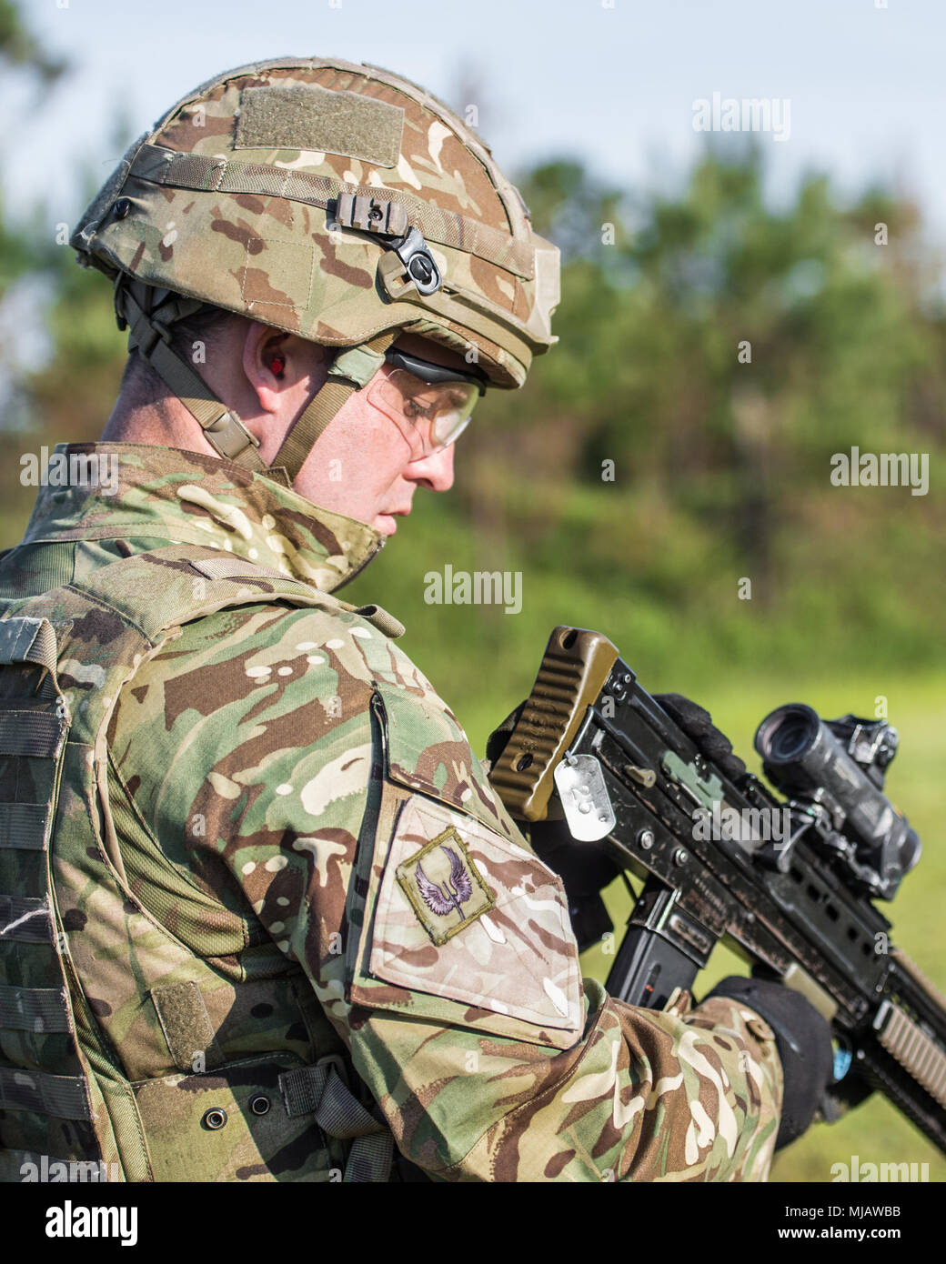 Royal Air Force Regiment soldier prepares to fire on range at the 47th ...