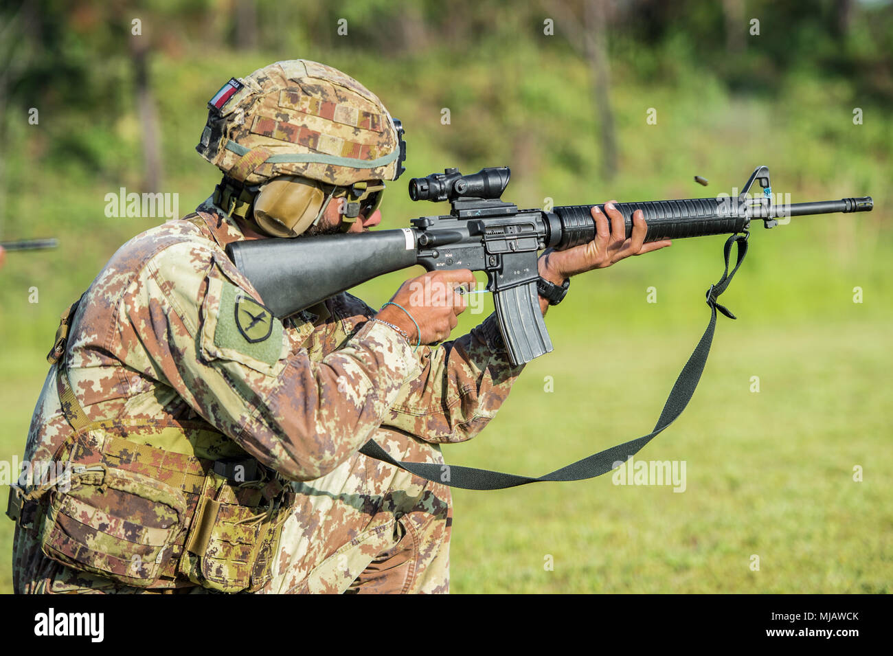 Italian Army Soldier fires M16 rifle on range at the 47th Winston P ...