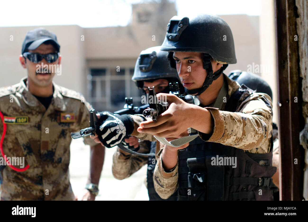 SOUTHWEST ASIA – An Iraqi Counter Terrorism instructor watches students ...
