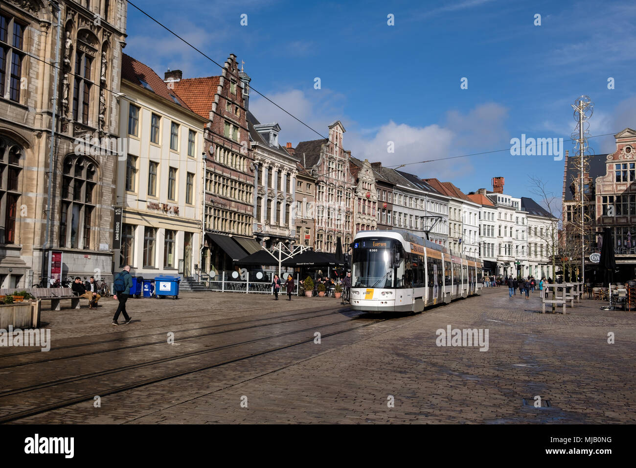 Ghent, Belgium - MARCH 11, 2018 : A tram crosses the Korenmarkt square ...