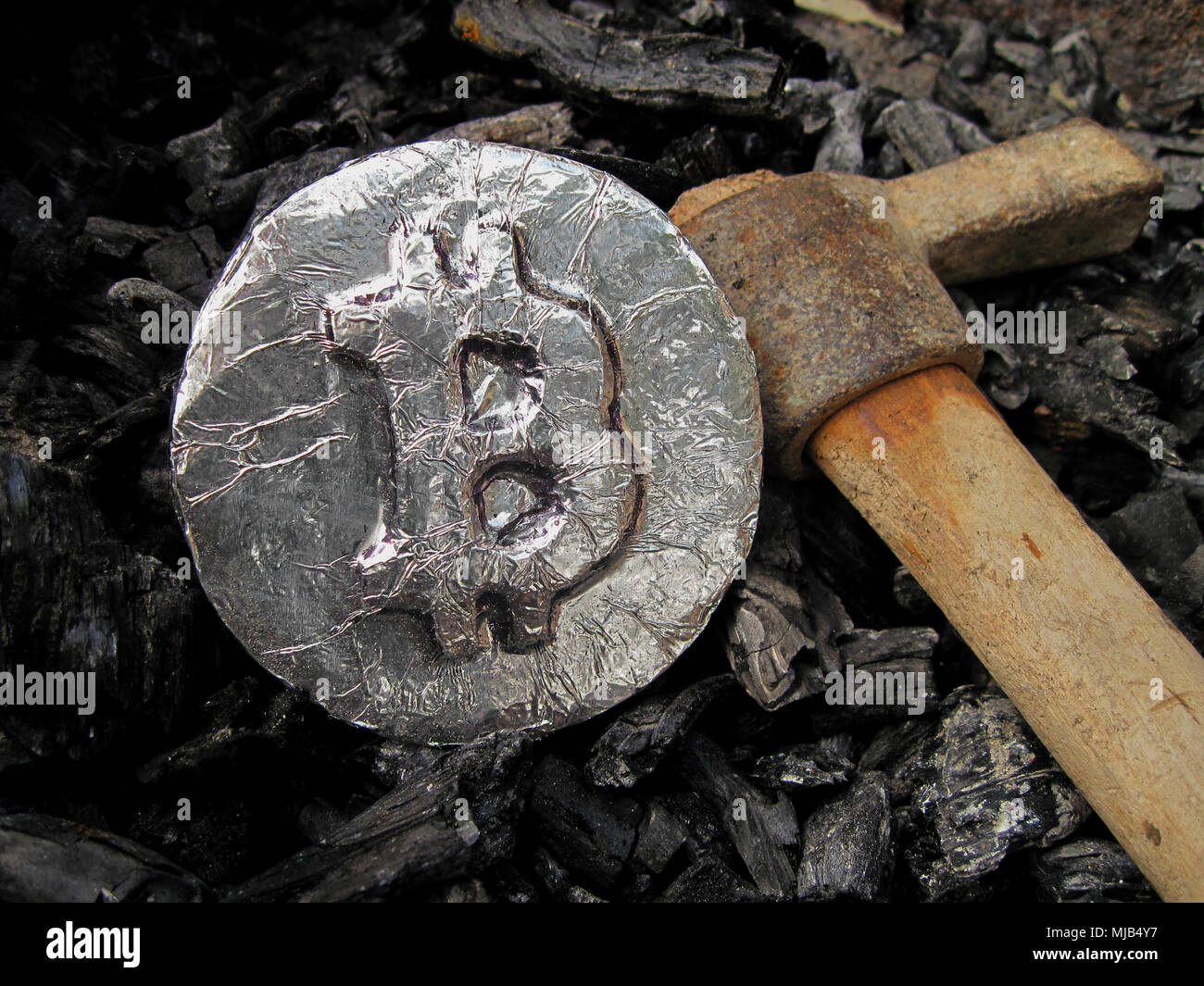 Bitcoin mining. A mine with real hardware. Symbols of block chain ...
