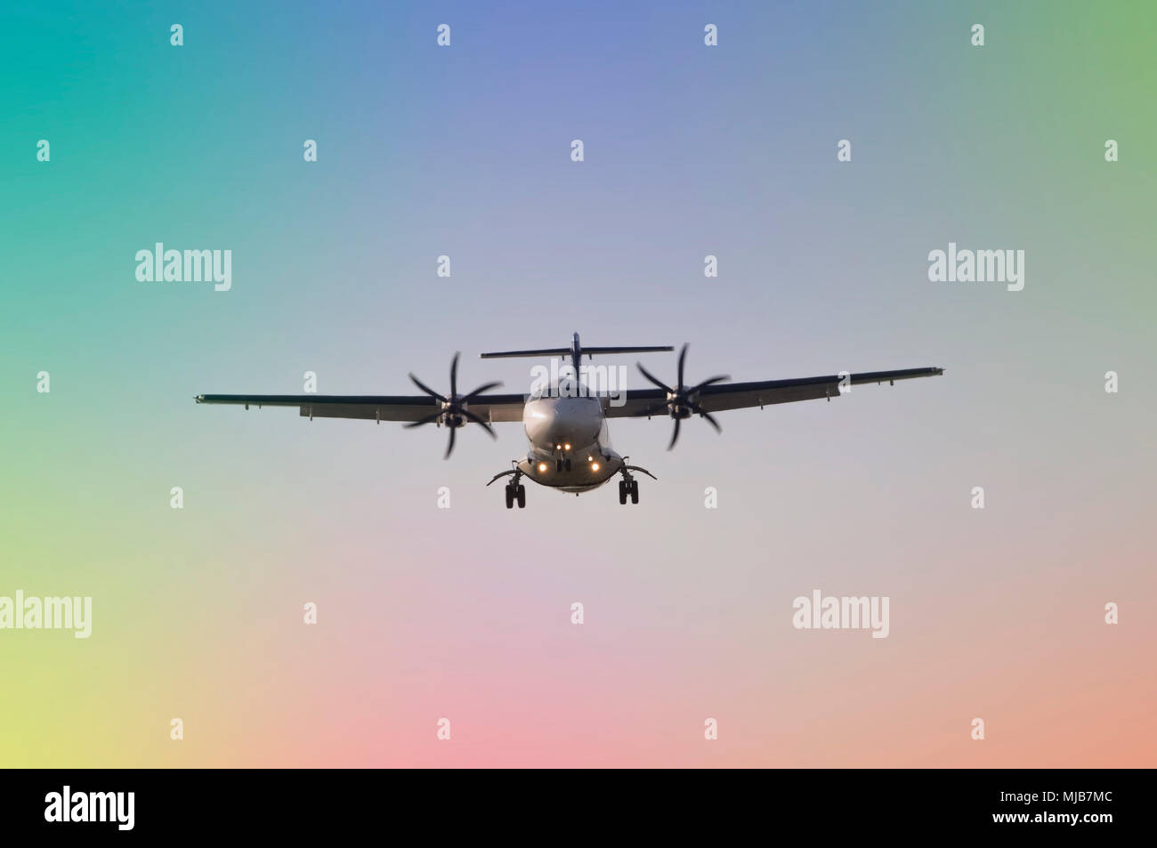 airplane flying with colorful background Stock Photo - Alamy
