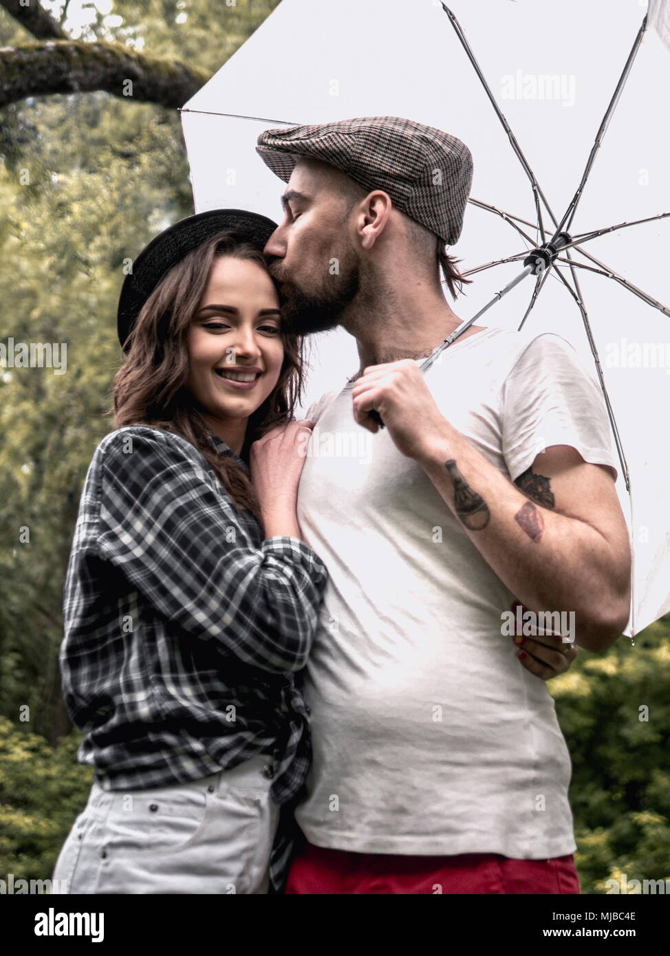 Couple Kissing Under Umbrella Silhouette Stencil