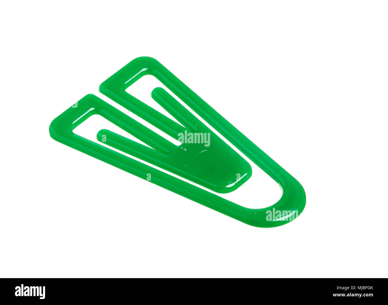 One green paper clip isolated on white background Stock Photo - Alamy