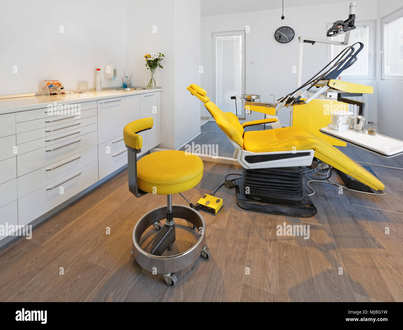 Yellow Dental Chair in Dentist Office Clinic Stock Photo - Alamy