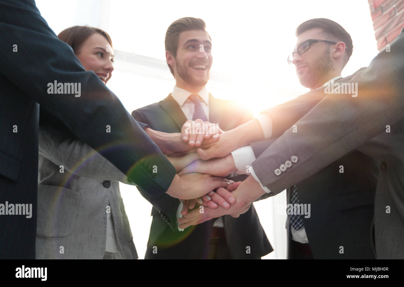 business people teamwork stacking hand together concept Stock Photo - Alamy