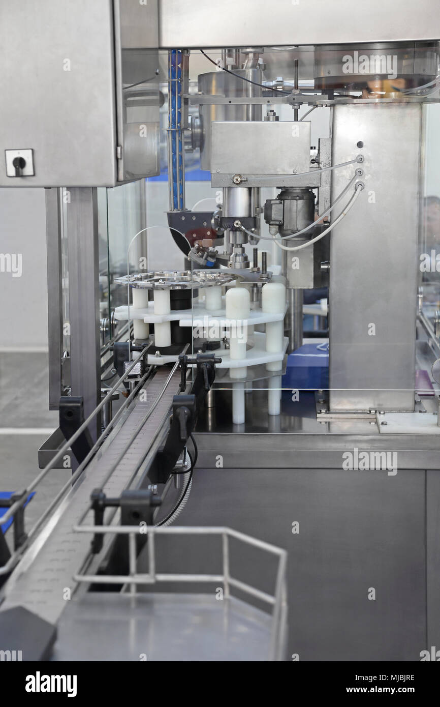 Packing Production Machine Line in Food Factory Stock Photo - Alamy