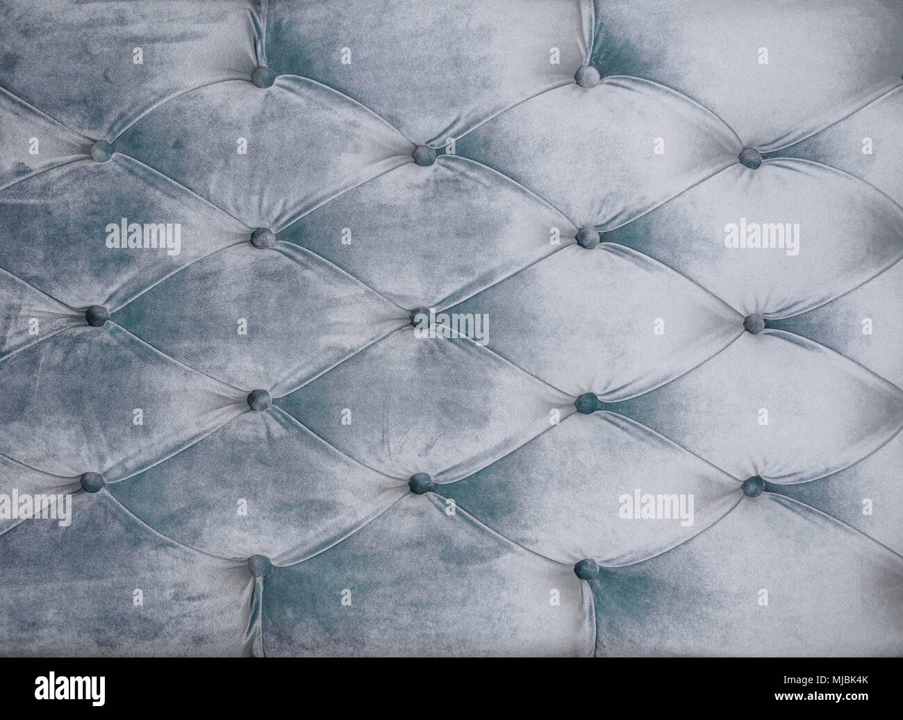 Coach-type velours screed tightened with buttons. Gray chesterfield ...