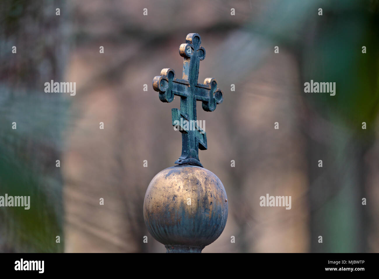 Old religious symbol made of brass in an old graveyard Stock Photo - Alamy