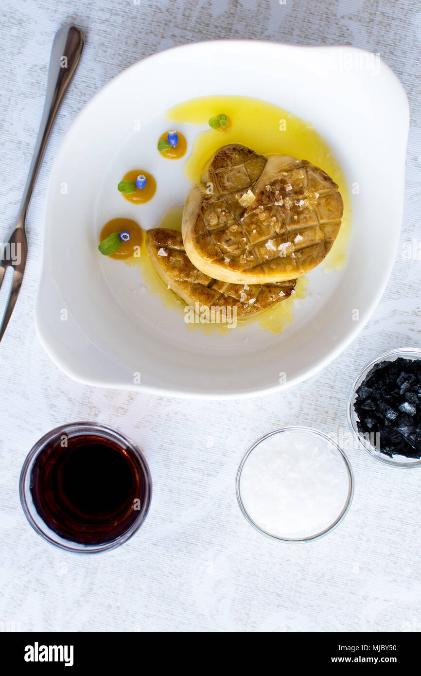 Fried Goose Liver with Apple Sauce on White Plate. Foie Gras Fine Food ...