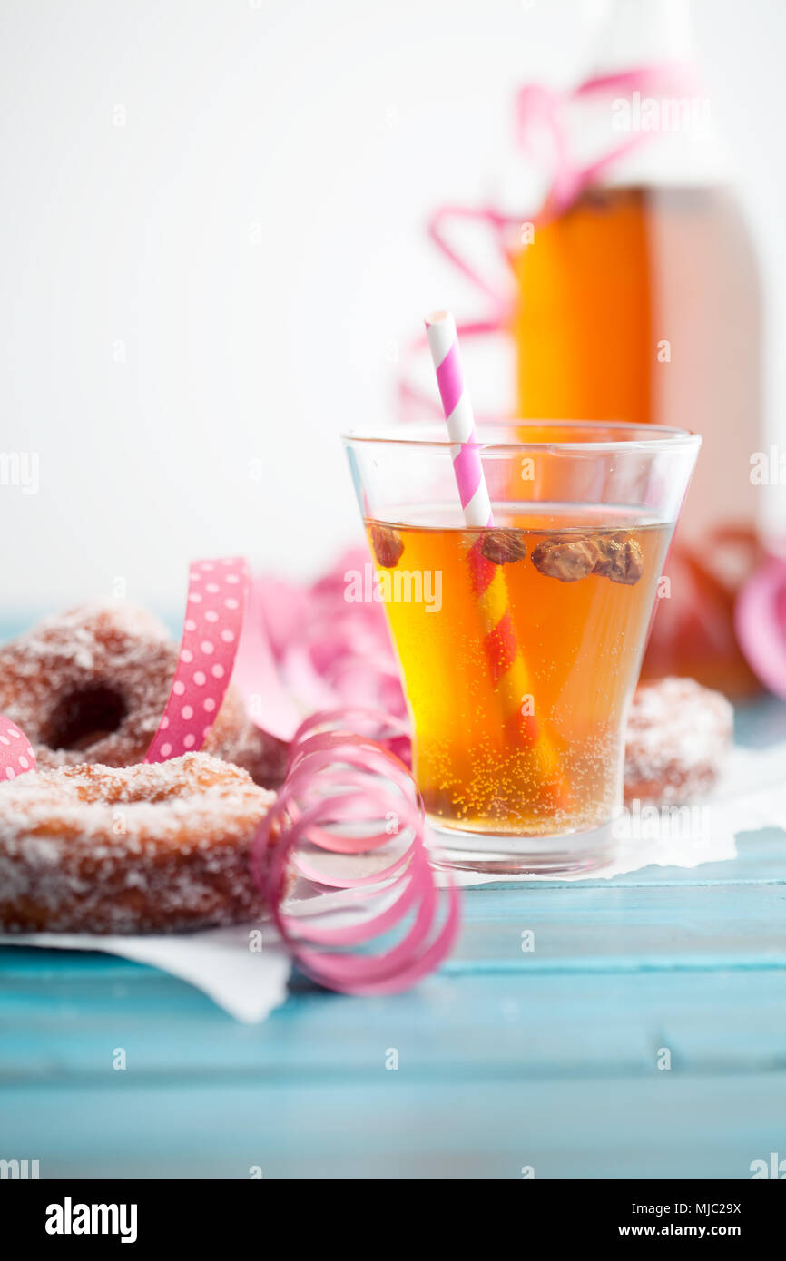 Traditional finnish sima and sugar donuts Stock Photo - Alamy