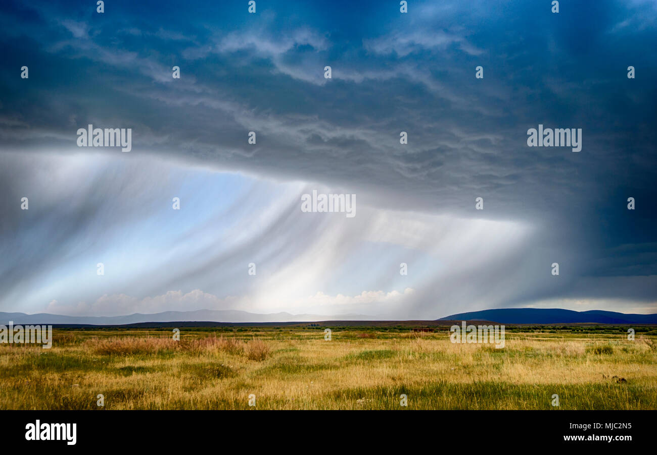 Powerful Rain Storm on Horizon Stock Photo - Alamy