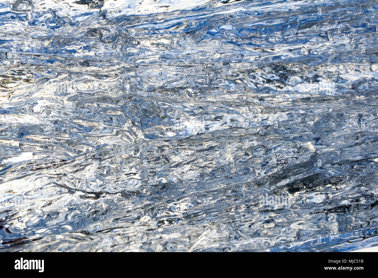 background, texture - wavy surface of melting ice on the skylight Stock ...