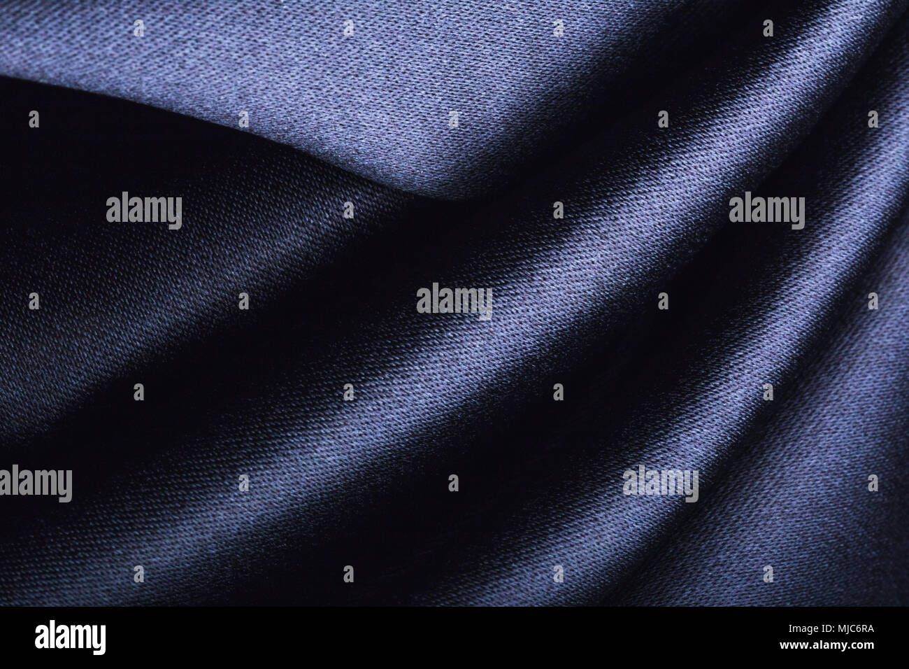 Wave forms of dark polyester fabric texture Stock Photo - Alamy