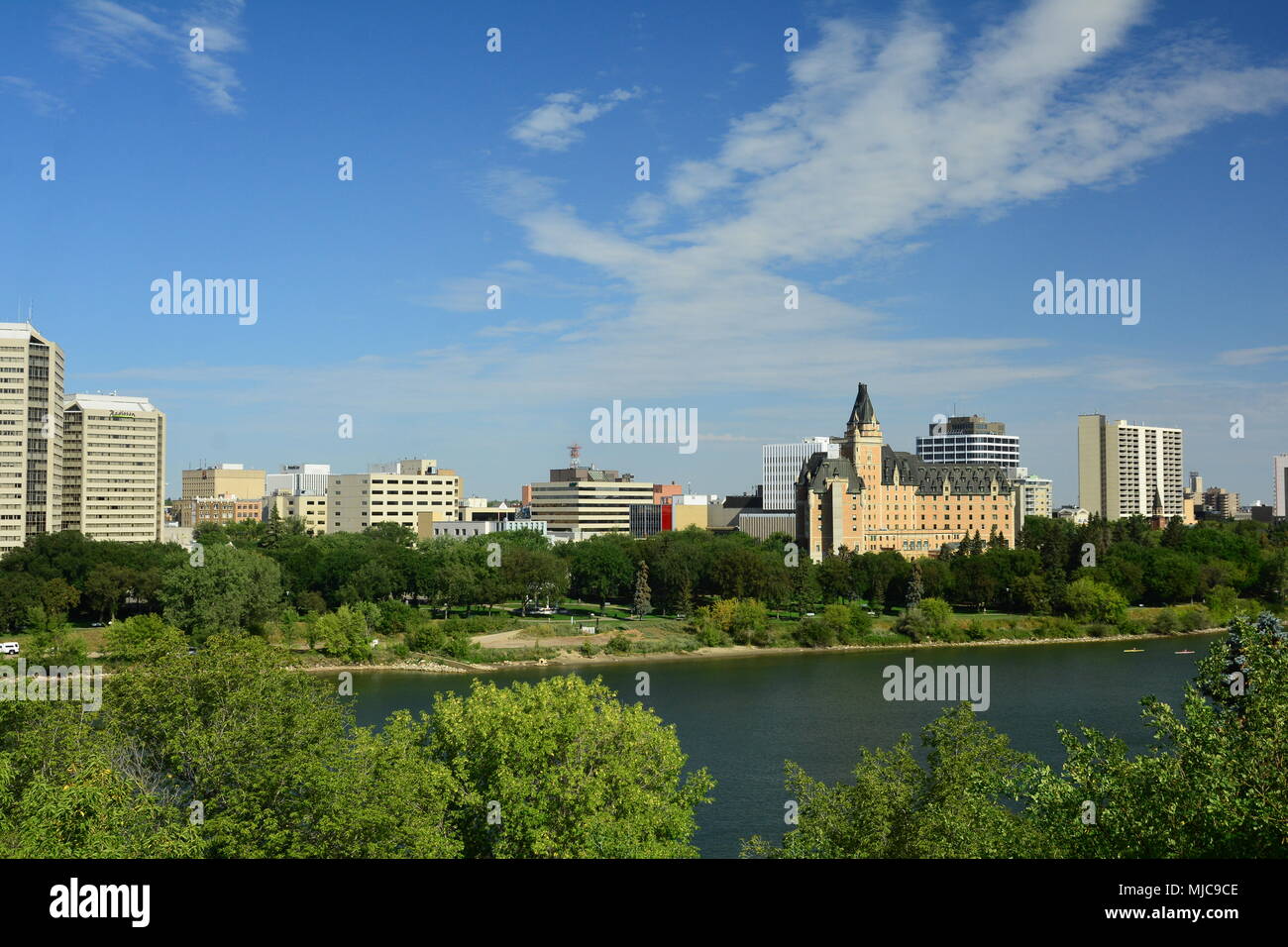 Saskatoon city skyline and the South Saskatchewan river that runs ...
