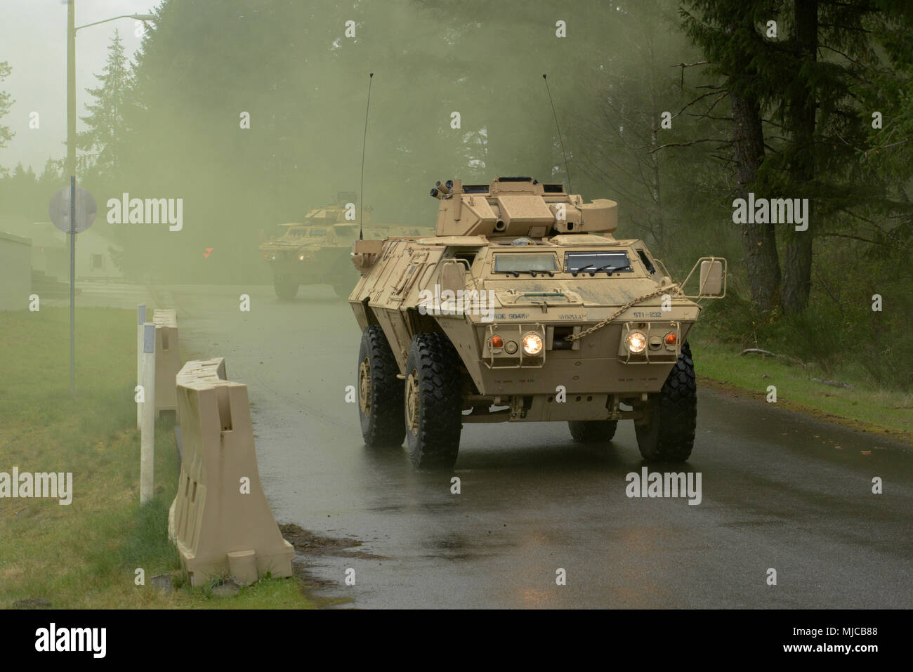 U.S. Army Soldiers play the role of enemy combatants as they move to ...