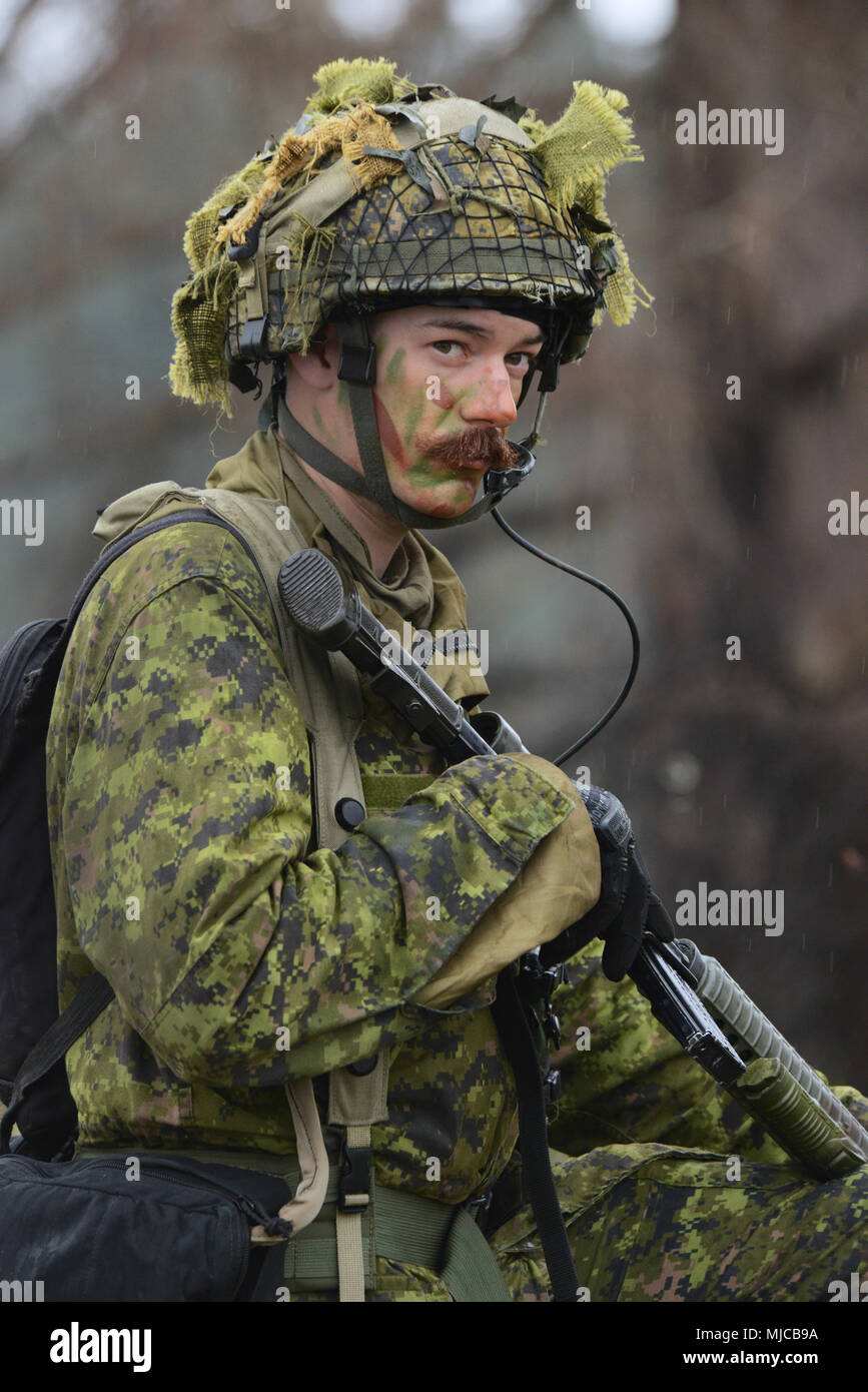 A Soldier assigned to the 39th Canadian Brigade Group holds a defensive ...