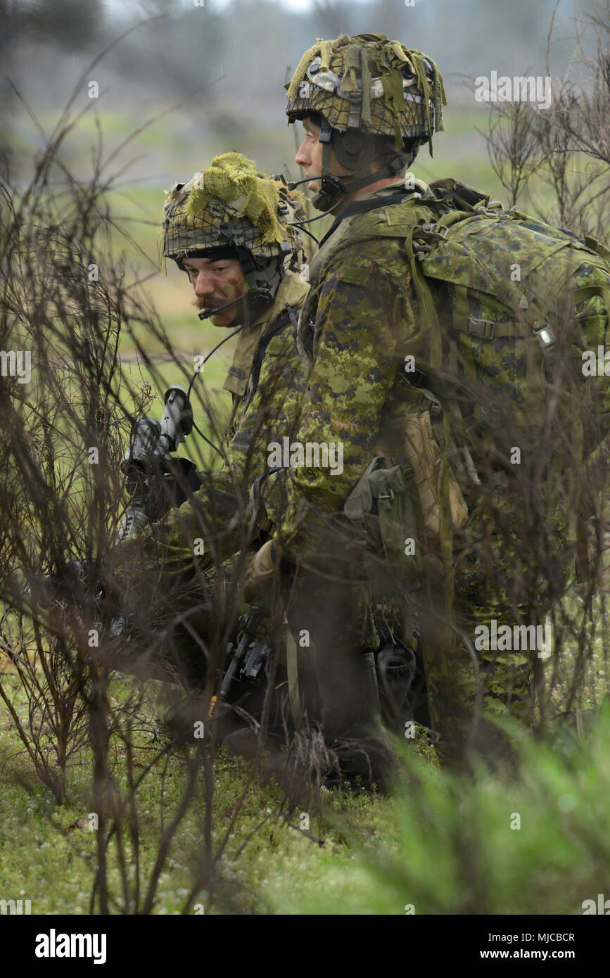 Soldiers assigned to the 39th Canadian Brigade Group hold a defensive ...