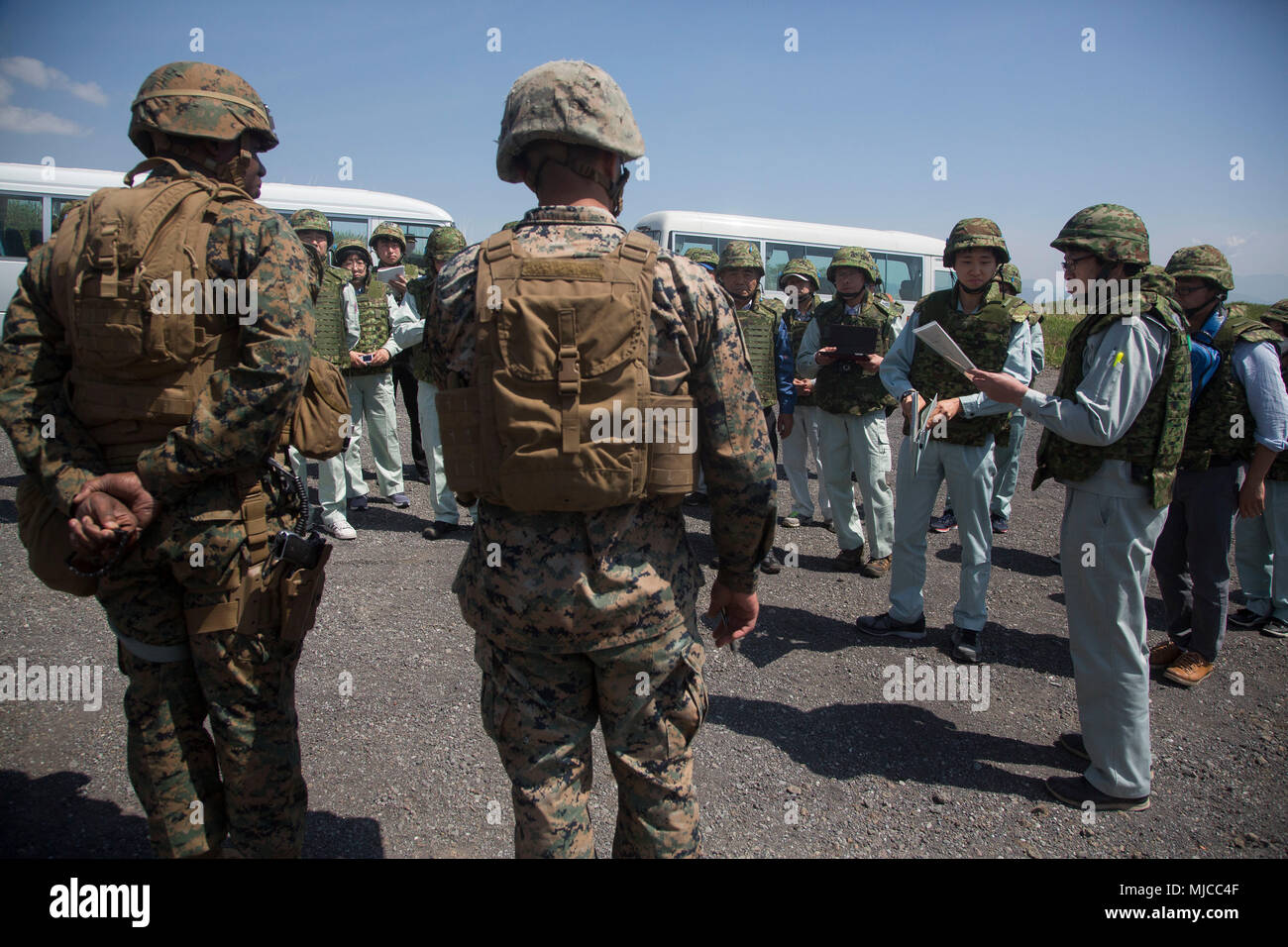 U.S. Marine Lt. Col. Leroy B. Butler addresses local nationals on May 1 ...