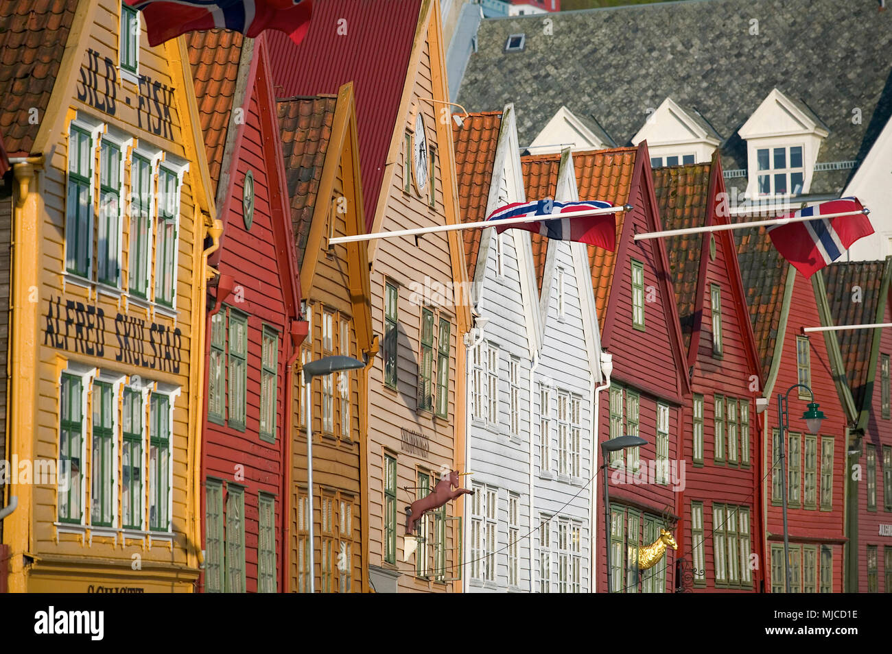 colorful wooden houses of Bryggen Quarter in the harbour of Bergen ...
