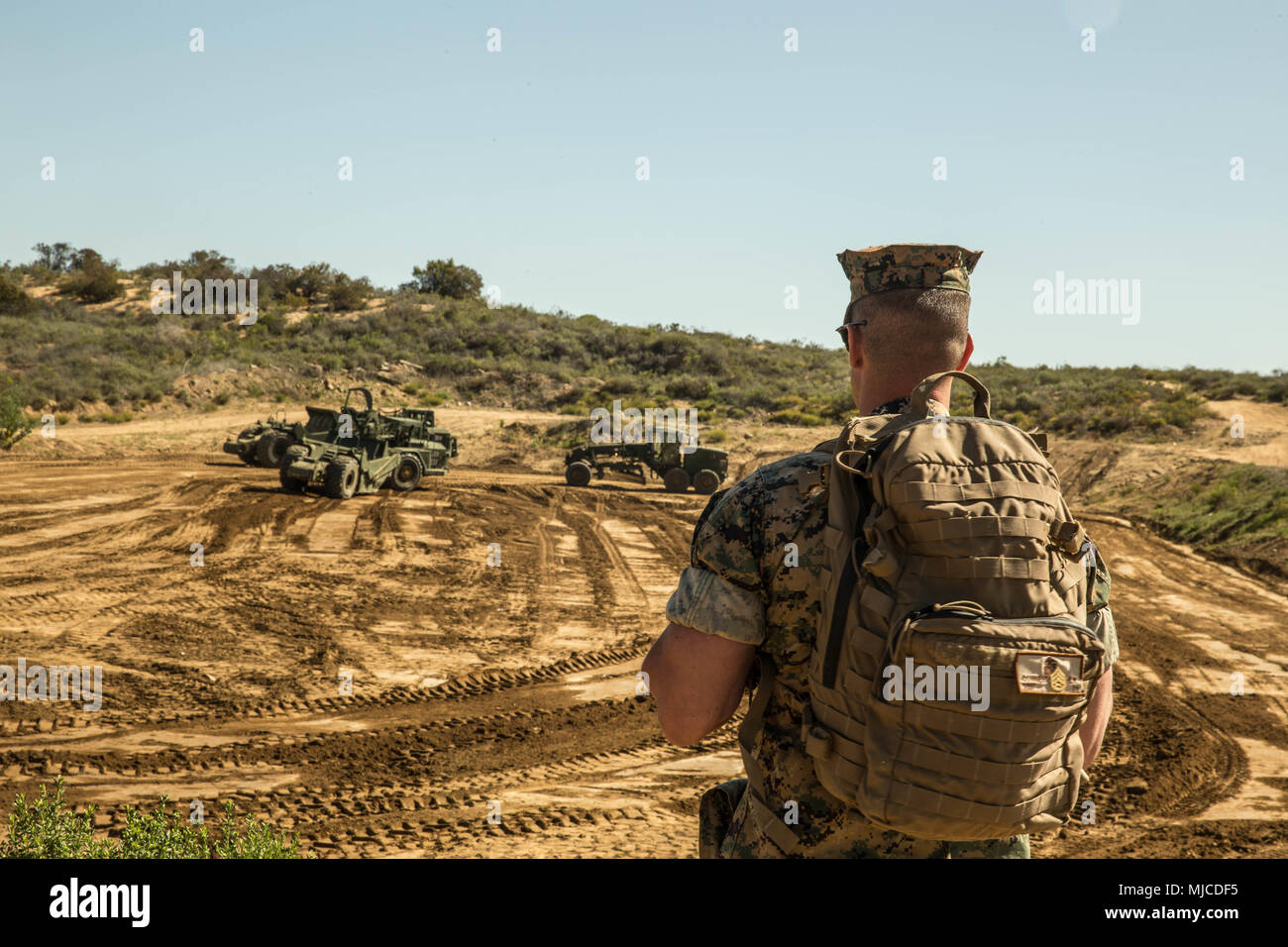 U.S. Marine Staff Sgt. Scott Comment, a heavy equipment operator with ...