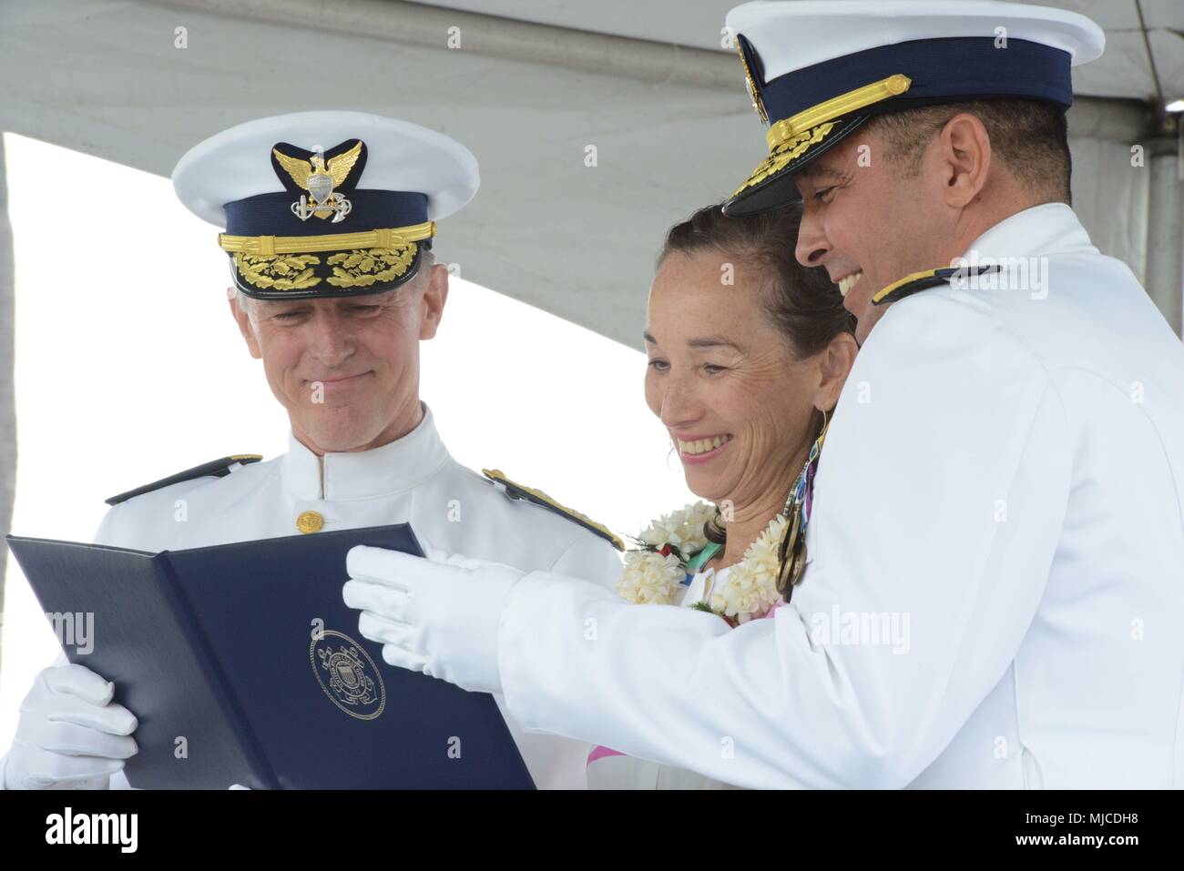 Commandant of the Coast Guard Adm. Paul Zukunft presents a Swivel Shot ...