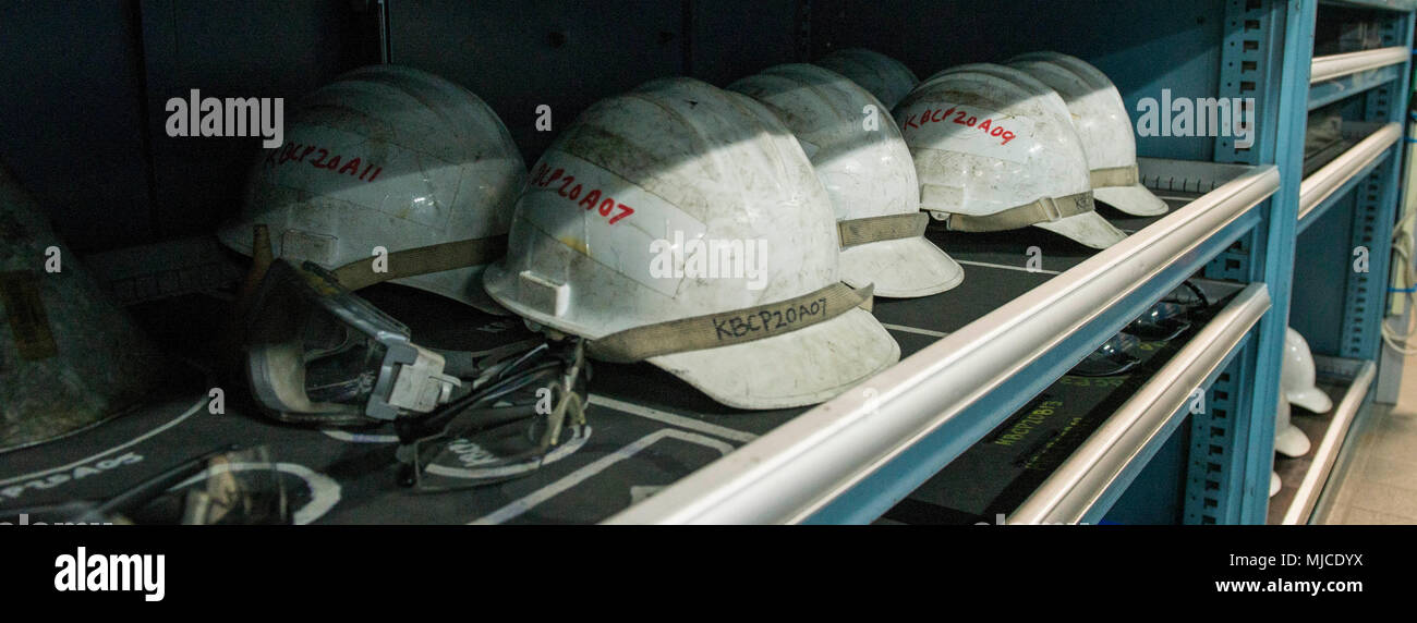 Hard hats lay on a shelf at the 18th Component Maintenance Squadron ...