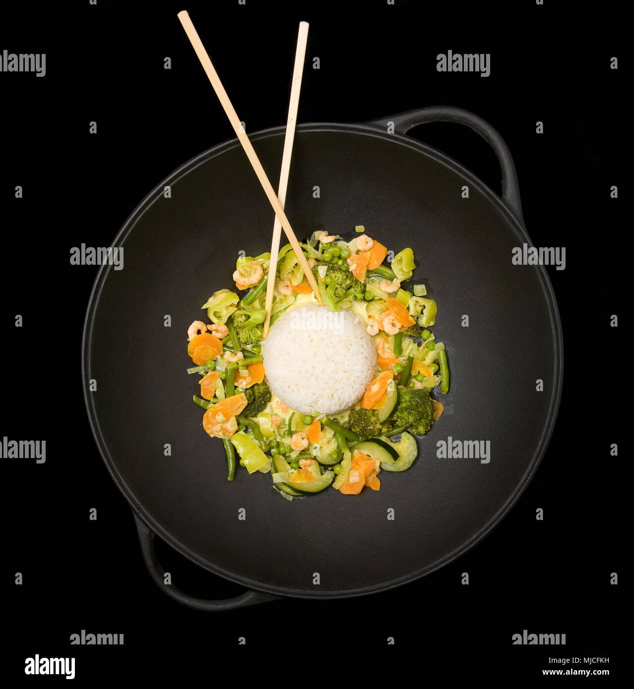 wok dish vegetarian with rice and vegetables, little rod Stock Photo ...