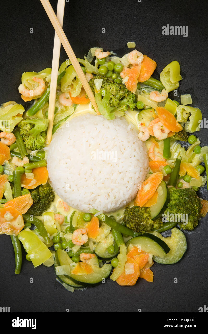 wok dish vegetarian with rice and vegetables, little rod Stock Photo ...