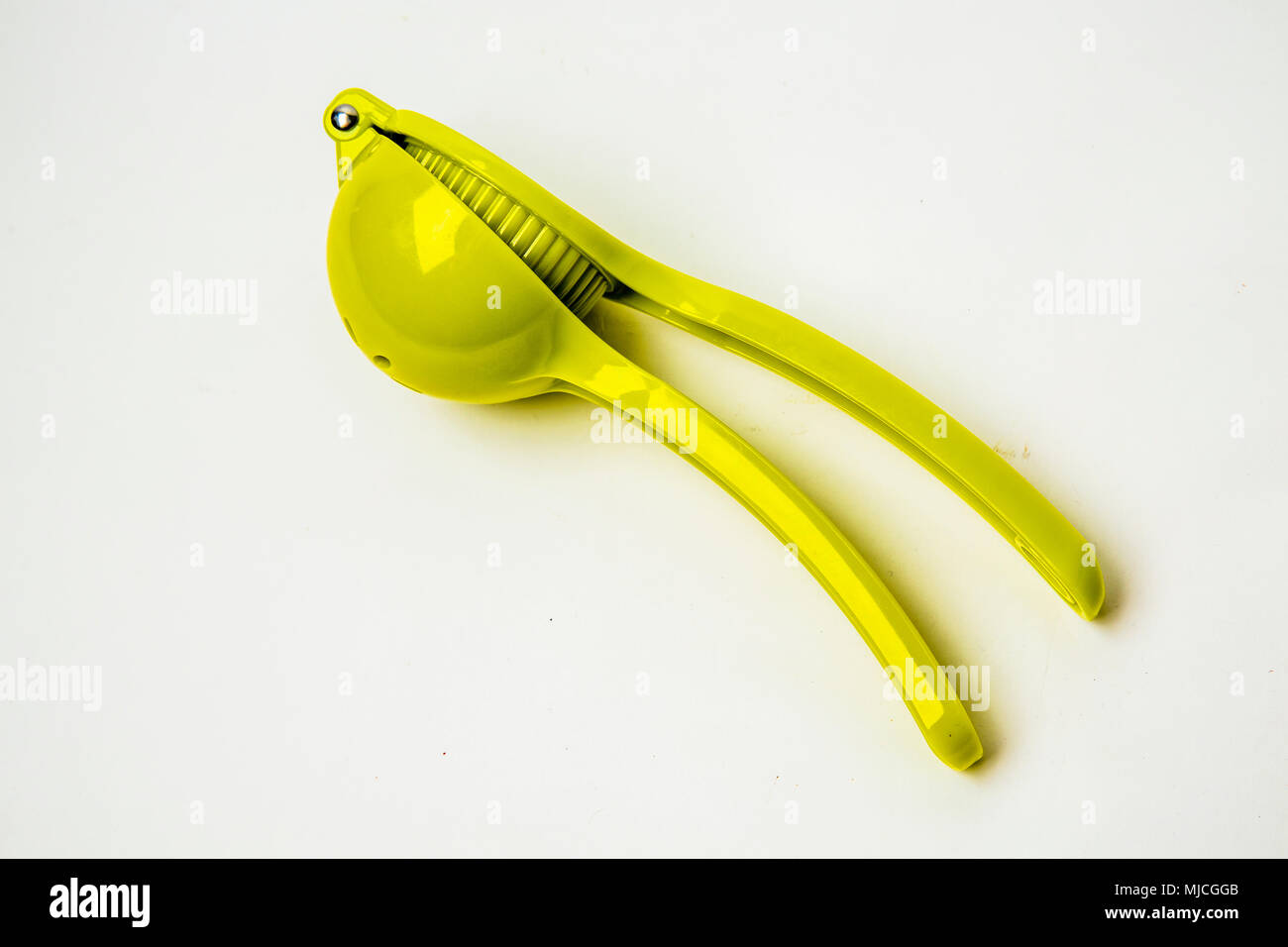 lemon squeezer in white background Stock Photo - Alamy