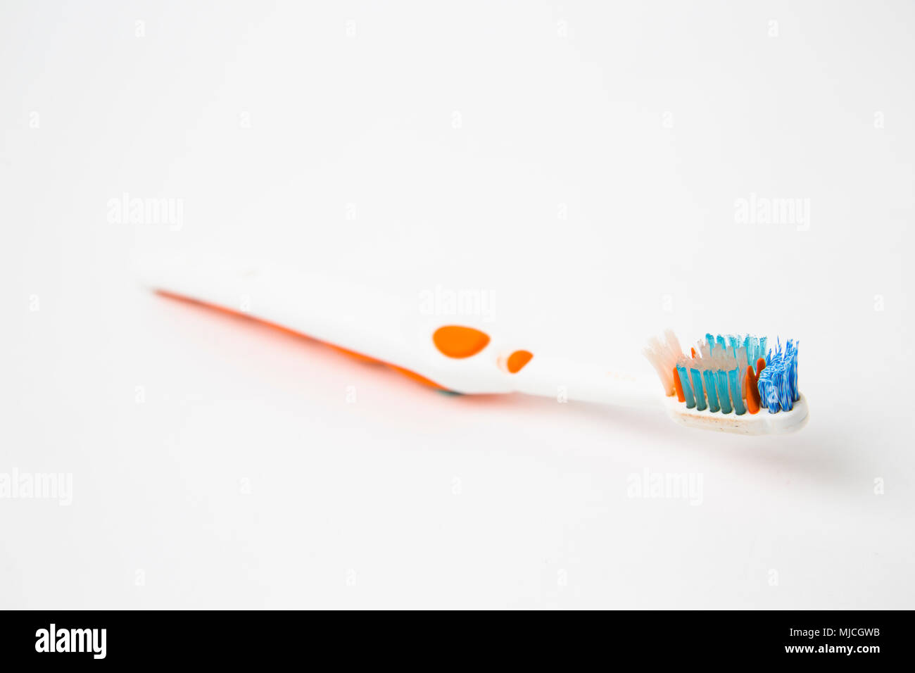 Toothbrush in white background Stock Photo - Alamy