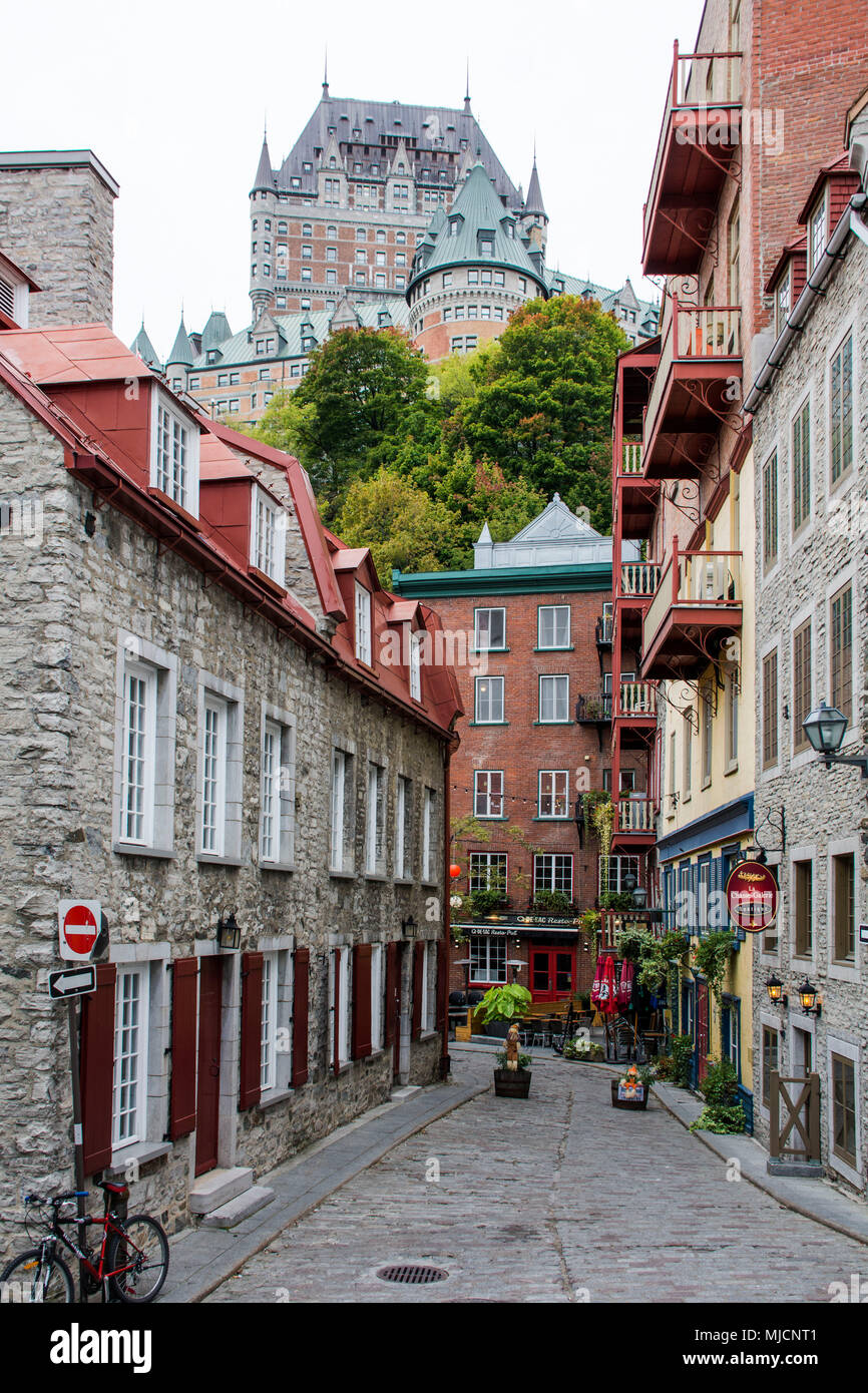 Old lane of the Lower Town (Basse-Ville) with fortress and the Château ...