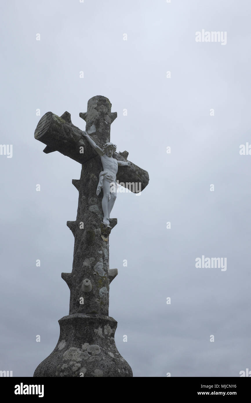 Cross with figure of Jesus Stock Photo - Alamy