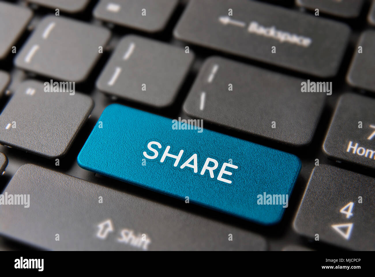 Share online content keyboard button for social media sharing concept ...