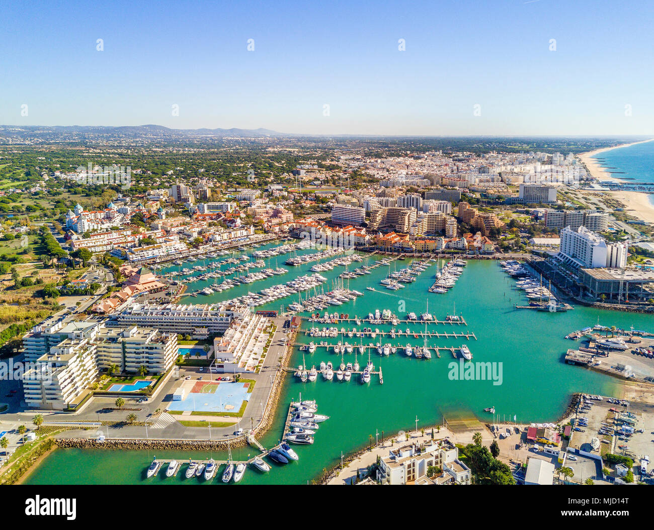 Aerial view of Vilamoura with charming marina and resorts, Algarve ...