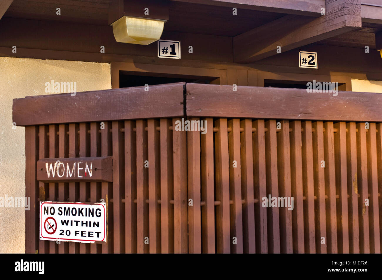 A rest stop women's restroom ironically designates rooms #1 and #2 ...