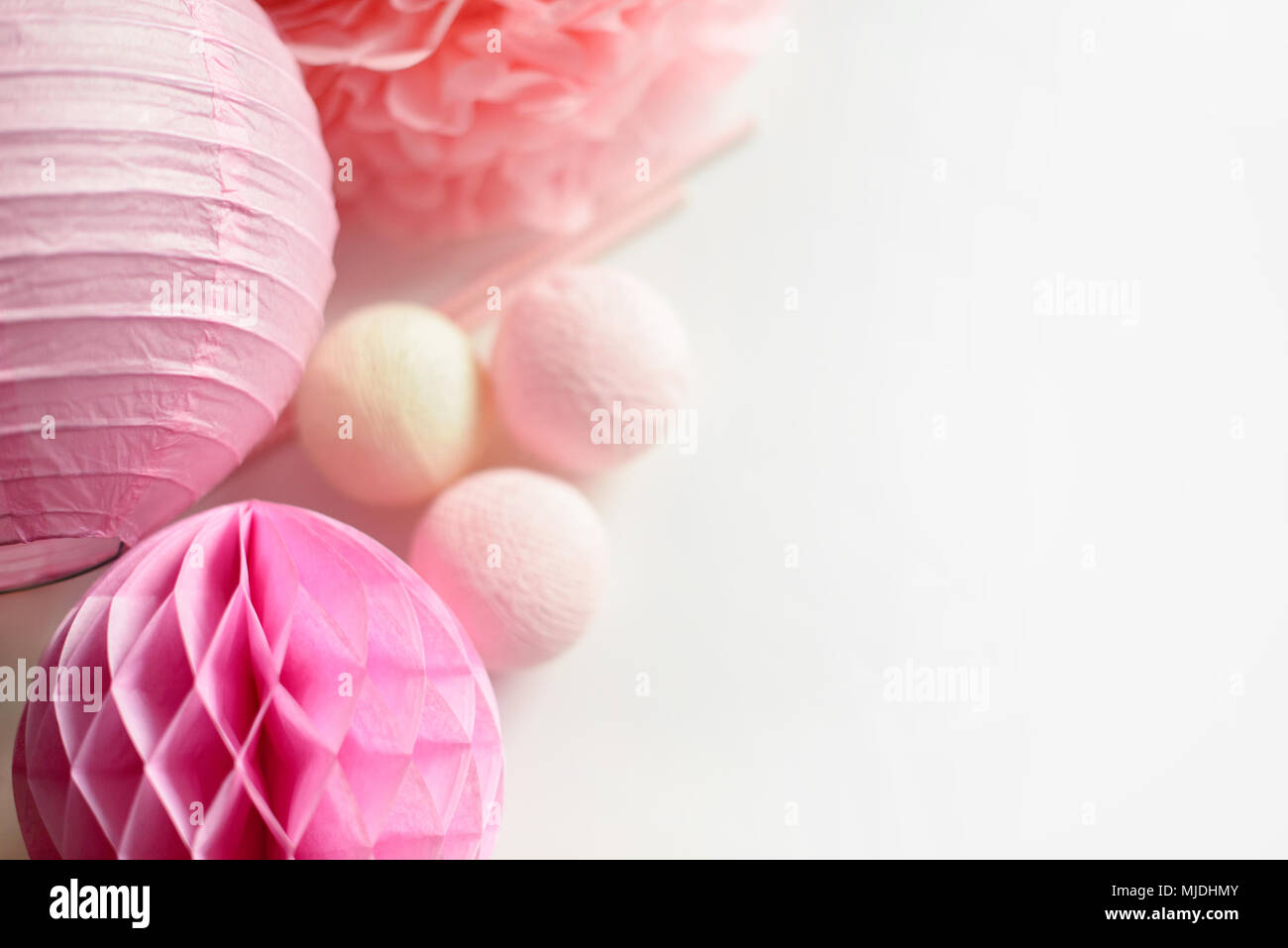 Various festive paper decor in pink color on white background. Free ...