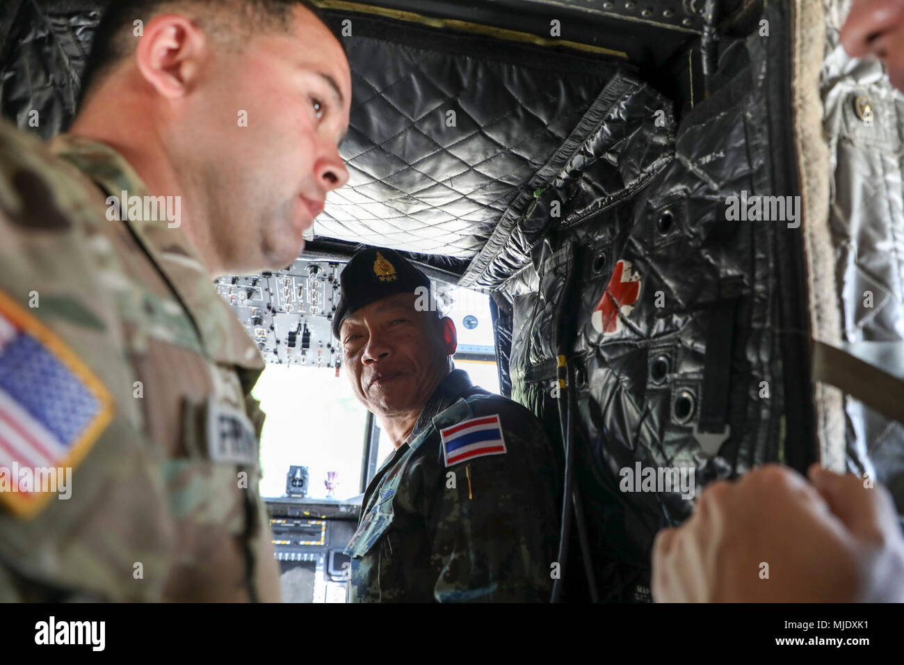 Royal Thai Armed Forces Lt. Gen. Tharakorn Thummawintorn (center), area ...