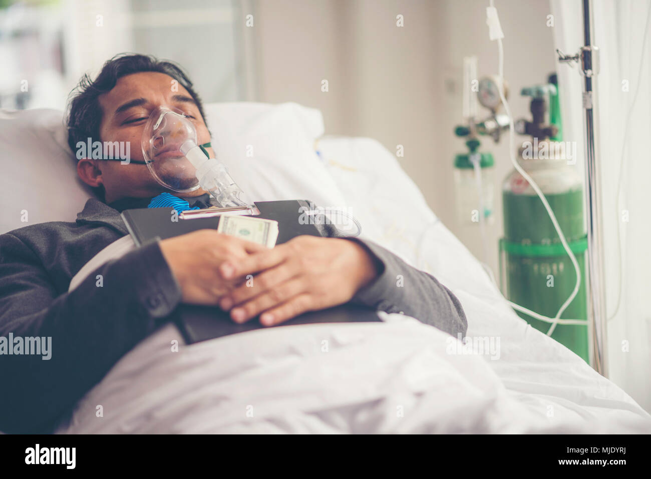 Hospital patient bed laptop typing hi-res stock photography and images ...