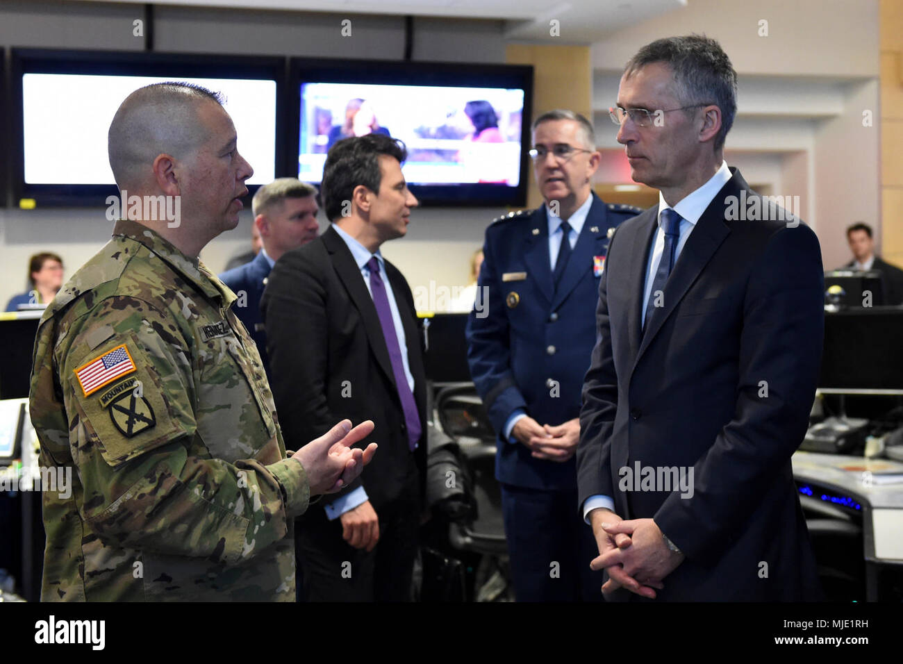 NATO Secretary General Jens Stoltenberg receives a brief from U.S. Army ...