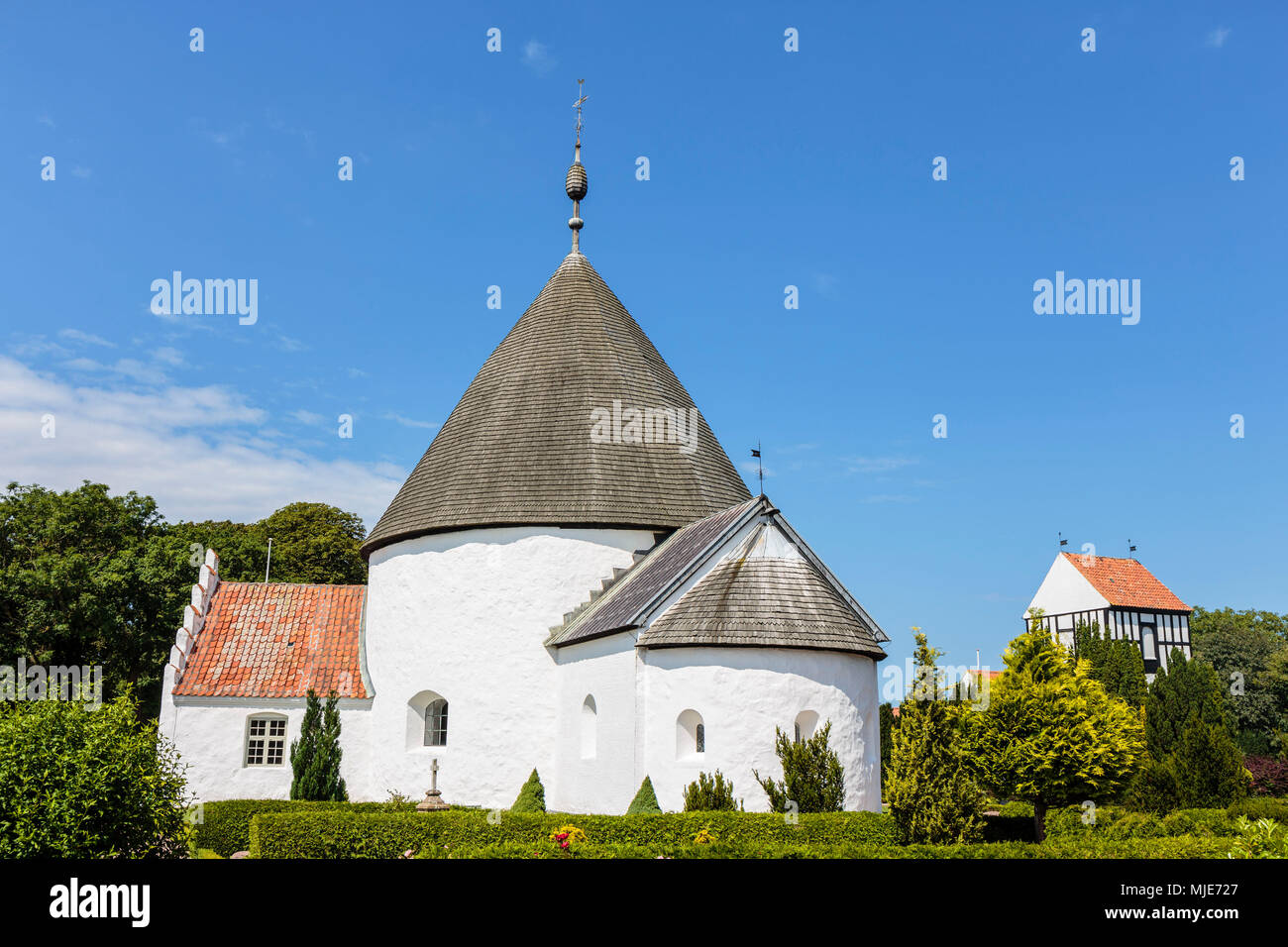 The Ny Kirke (12th century) in Nyker, on right side the freestanding ...