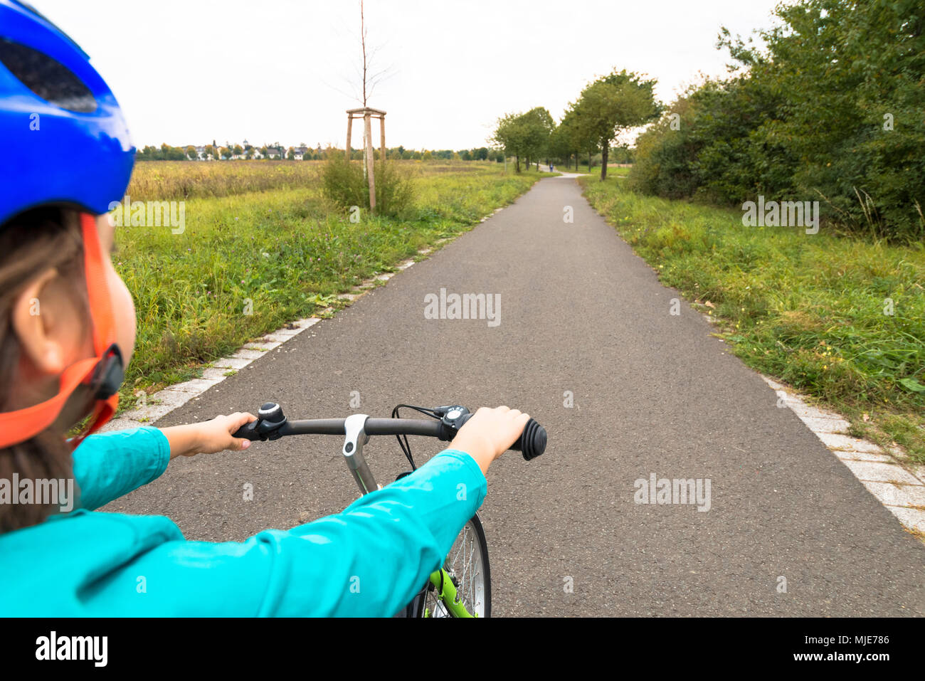 Child while cycling, sideways, detail, close-up, cut-out Stock Photo ...