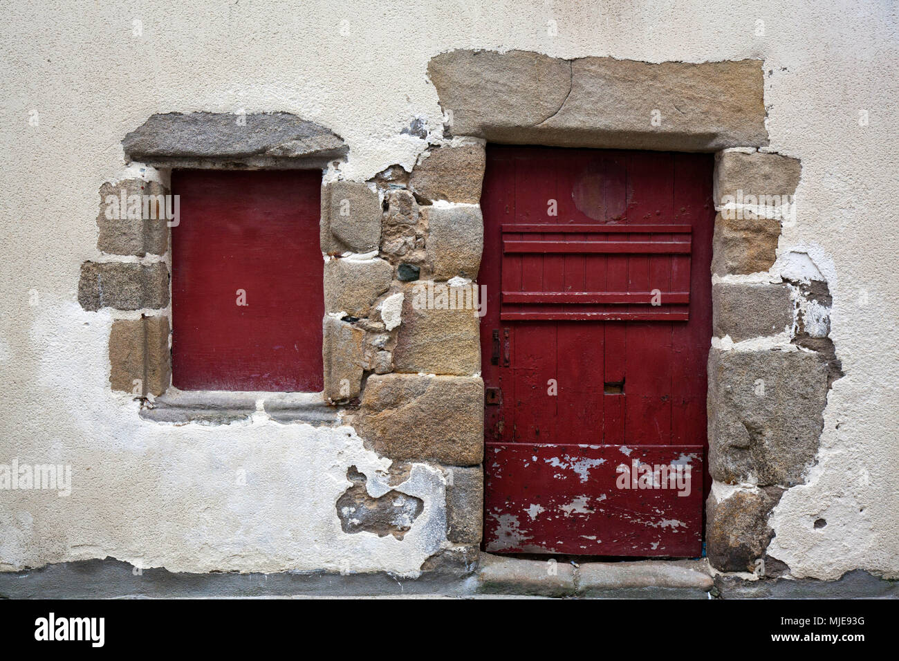 plastered house facade made of stone blocks Stock Photo - Alamy